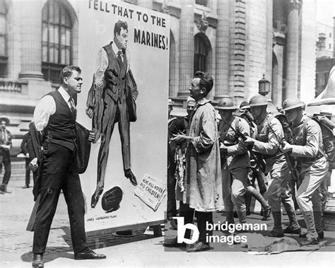 Image Of American Artist James Montgomery Flagg Poses Beside His Anti