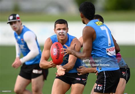 Marcus Windhager of the Saints handballs during a St Kilda Saints AFL... News Photo - Getty Images