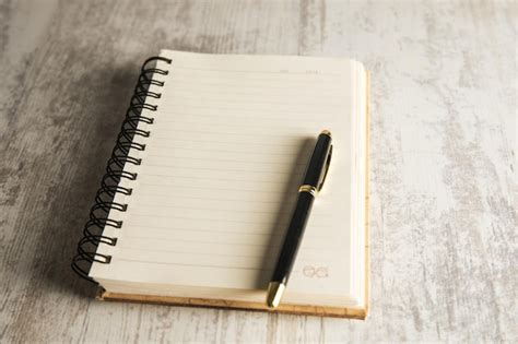 Premium Photo Notepad And Pen