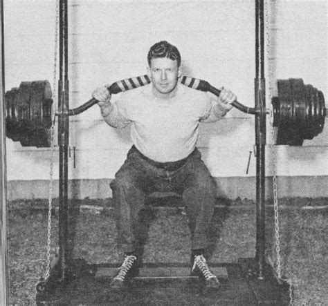 The Tight Tan Slacks Of Dezso Ban Squatting For Increased Strength