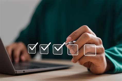 Premium Photo Checklist Concept Businessman Using Laptop And Checking