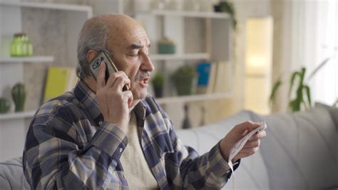 Old Man Talking On The Phone About High Incoming Bill Debt Angry At