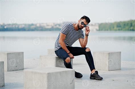Handsome Tall Arabian Beard Man Model At Stripped Shirt Posed Outdoor