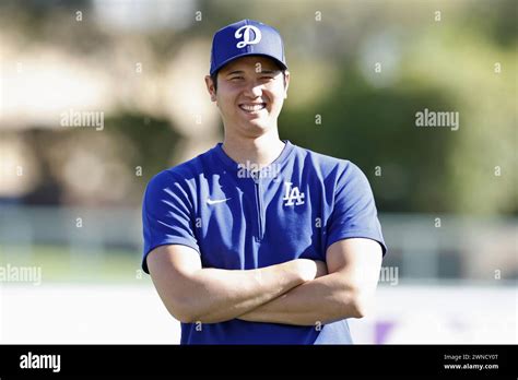 Shohei Ohtani Of The Los Angeles Dodgers Smiles During Practice Before