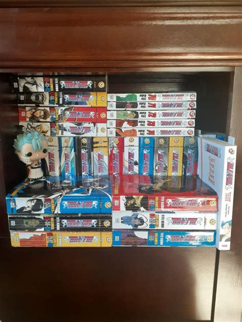 The Entire Bleach Manga Series That I Own Plus A Lil Pop Doll Of