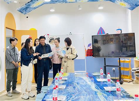 访企拓岗西安思源学院体育学院院长许万林带领师生代表赴两家艺术中心走访交流