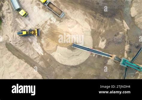 Wheel Loader Load Sand In Dump Truck In Open Pit Heavy Machinery On