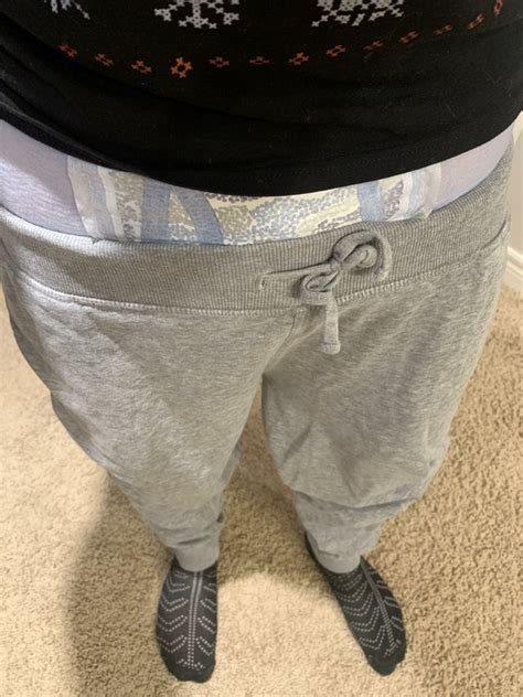 Soaked Diaper Leaks Into Gray Sweatpants Photo Sets Diapered