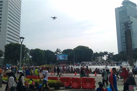 Foto Drone Jerat Warga Yang Buang Sampah Sembarangan Di Car Free Day