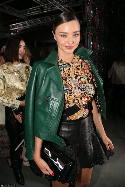 Miranda Kerr Shows Off Her Slender Frame In Short Skirt At Paris