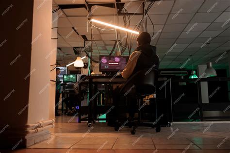 Premium Photo Dangerous Hacker Using Spyware And Accessing Database