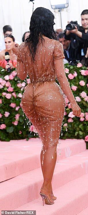 Kim Kardashian Accentuates Her Hourglass Curves In Skintight Caramel