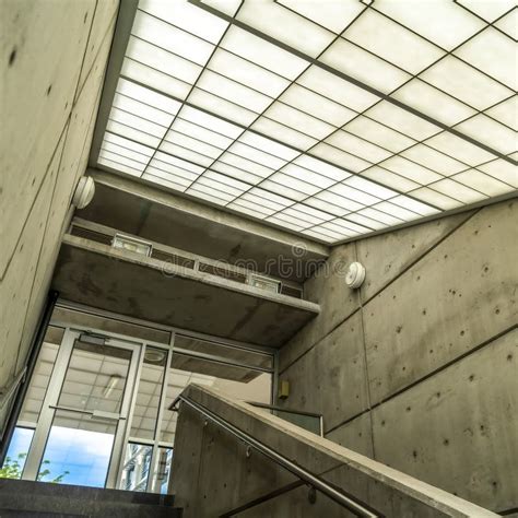 Square Indoor Staircase Of Commercial Building That Leads To The