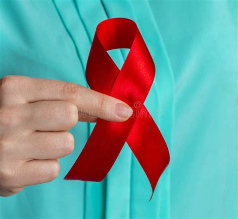 Healthcare And Medicine Concept Female Hands Holding Red Aids Stock