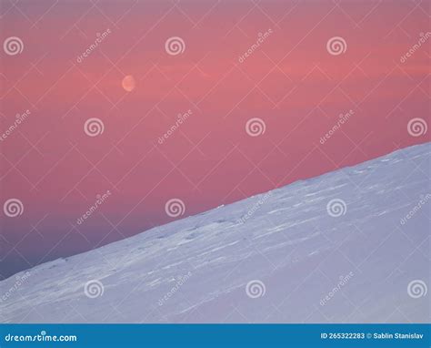 Atmospheric Minimalist Landscape With Moon Over High Snowy Mountain