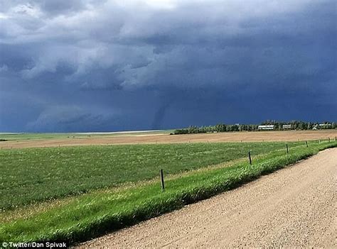 Alberta Canada Man Lazily Ignores Raging Tornado And Keeps Mowing