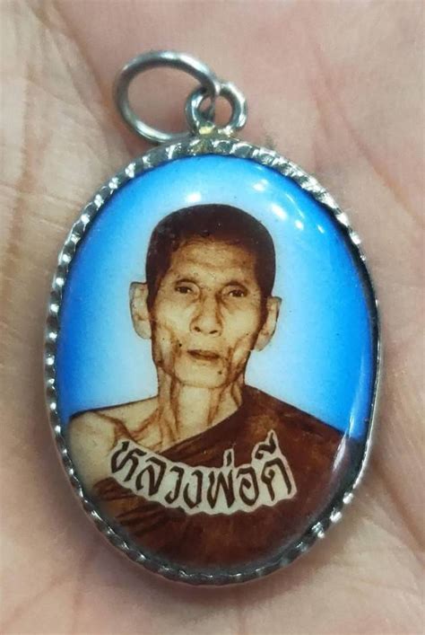 G ประมูลพระเครื่องการันตีพระ คอม