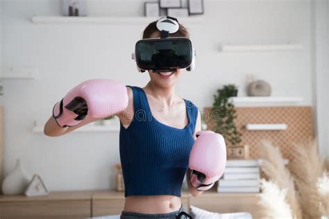 Young Asian Woman Fighter Boxer Fit Girl In Vr Glasses Wearing Boxing