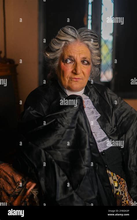 Senior Judge In A Traditional Robe Deep In Thought About Law And