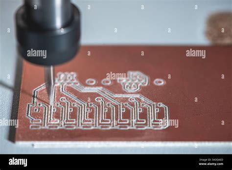 Machine With Numerical Control Cnc Carries Out Milling Of Printed Circuit Boards Circuit