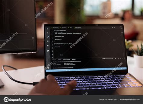 Male Programmer Using Coding Encryption Interface App Laptop Screen