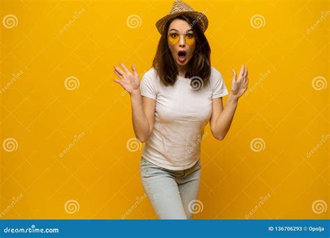 Excited Young Woman In White T Shirt Widely Smiling Looking At Camera