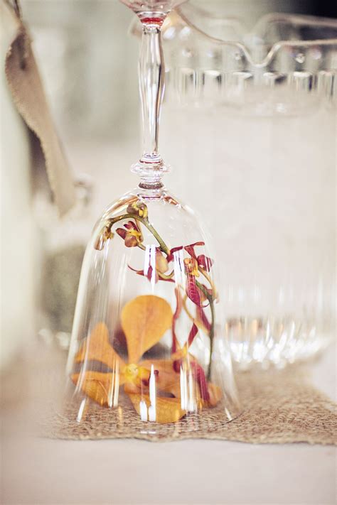 Floral Underneath Upside Down Wine Glasses Make For Beautiful