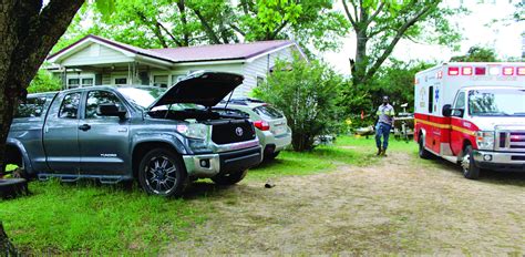Vehicle Falls On Woman Clayton Record