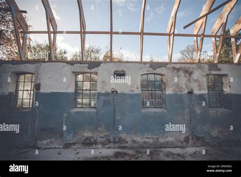 Building Without A Roof With Grunge Blue Wall And Old Windows Ready For