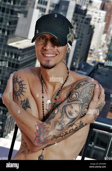 Latin Fusion Singer Chelo Shows Off His Tattoos As He Poses For Photos In New York Thursday