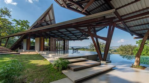 Angular Canopies Shelter Lateral Verandah House By Malik Architecture