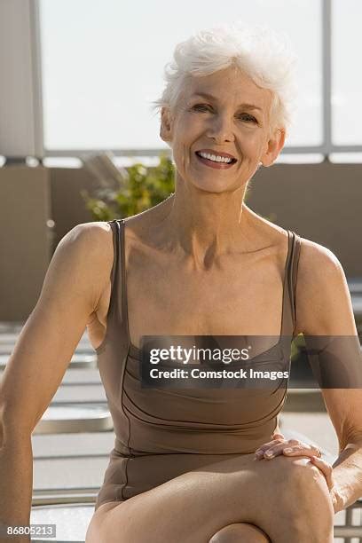 Confident Woman Bathing Suit Photos And Premium High Res Pictures