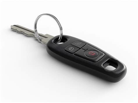 A Closeup View Of A Modern Car Key Fob On A White Background Premium Ai Generated Image