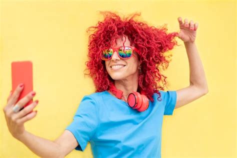 Premium Photo Closeup Of A Latin Woman With Red Afro Hair Sunglasses