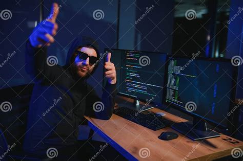 hacker is hacking into the computer network computer criminal stock