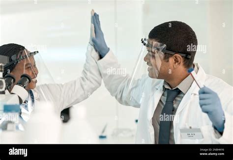 Case Solved Case Closed Two Scientists Giving Each Other A High Five