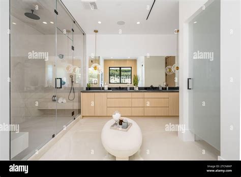 This Modern Bathroom Features A Spacious And Luxurious Walk In Shower