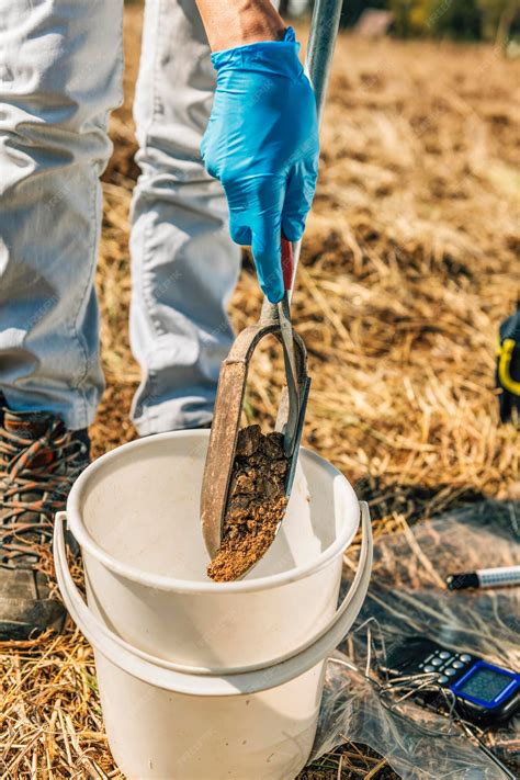 Premium Photo Soil Sampling Agronomist Taking Sample With Soil Probe