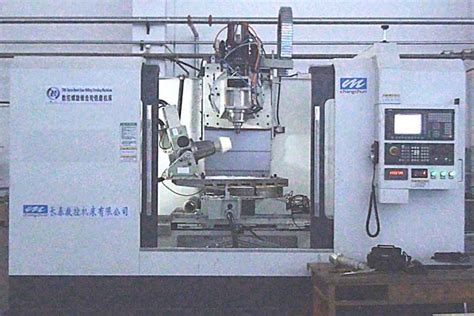 Development Of Principle Prototype Of Two Axis Linkage Gear Milling Machine For Spiral Bevel