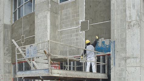 why is concrete masonry unit construction not more common in america