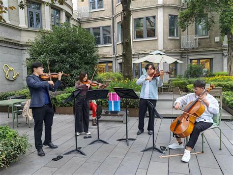 劳动报 上海街头奏响“繁花金曲”，香港弦乐团点亮申城“艺术天空”