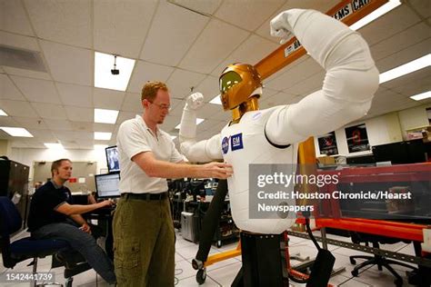 Lyndon Bridgwater A Robotic Systems Engineer With Nasa Checks The News Photo Getty Images