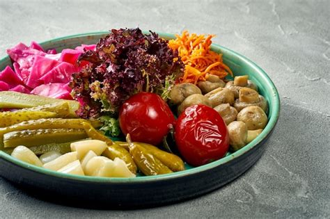 Premium Photo Ukrainian Assorted Pickled Vegetables In A Plate On A