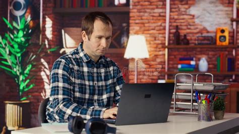 Man Seated At Home Office Desk Using Laptop Checking Emails Stock Video Video Of Messages