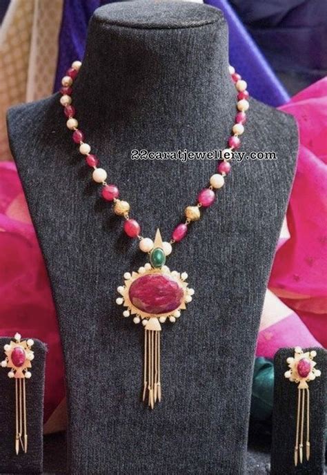 Simple Ruby Drops Set With Locket Jewellery Designs