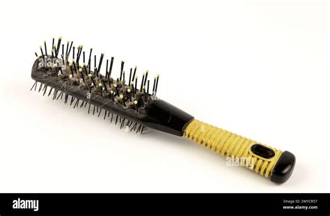 A Round Hair Brush Dirty Hair Brush On A White Background The Concept