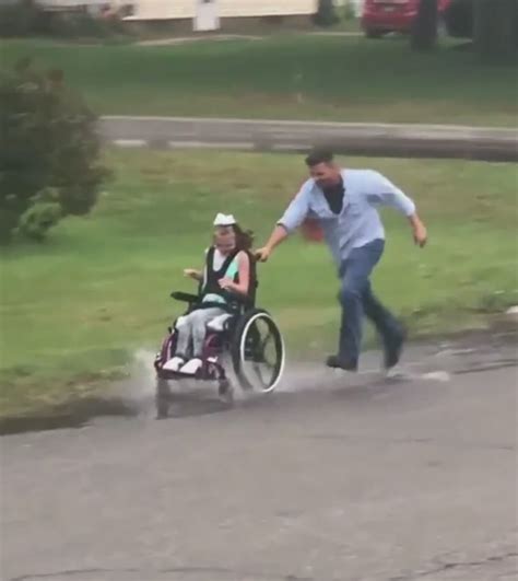 Dad Pushes Daughter In Wheelchair Through Puddles Faithpot