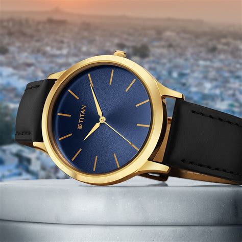 Buy Online Titan Karishma Radiance Blue Dial Analog Leather Strap Watch