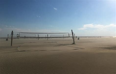 Premium Photo Volleyball Net At Sandy Beach