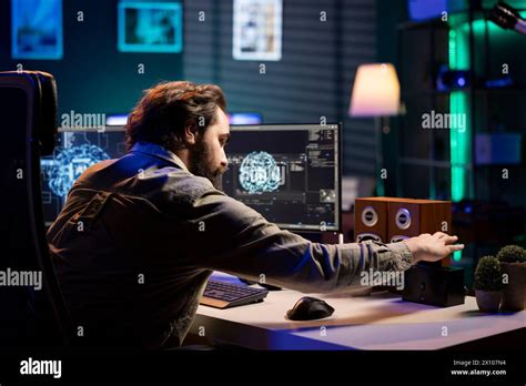 software technician inserting disk in computer with rogue